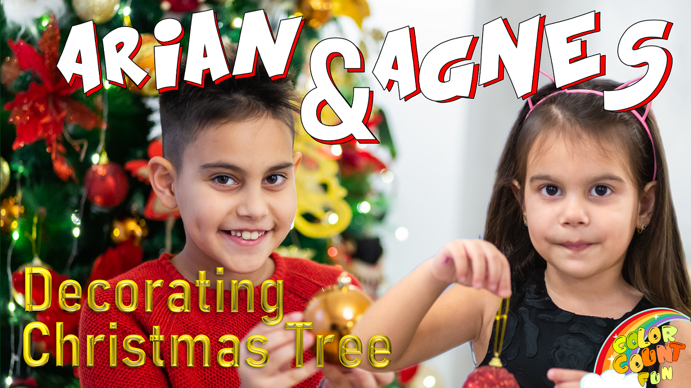 Arian and Agnes decorating Christmas tree alone with children music ...